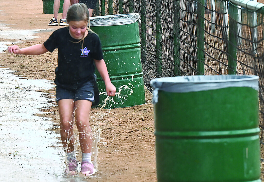 RAINED OUT AT HORSE RACES - Fredericksburg Standard